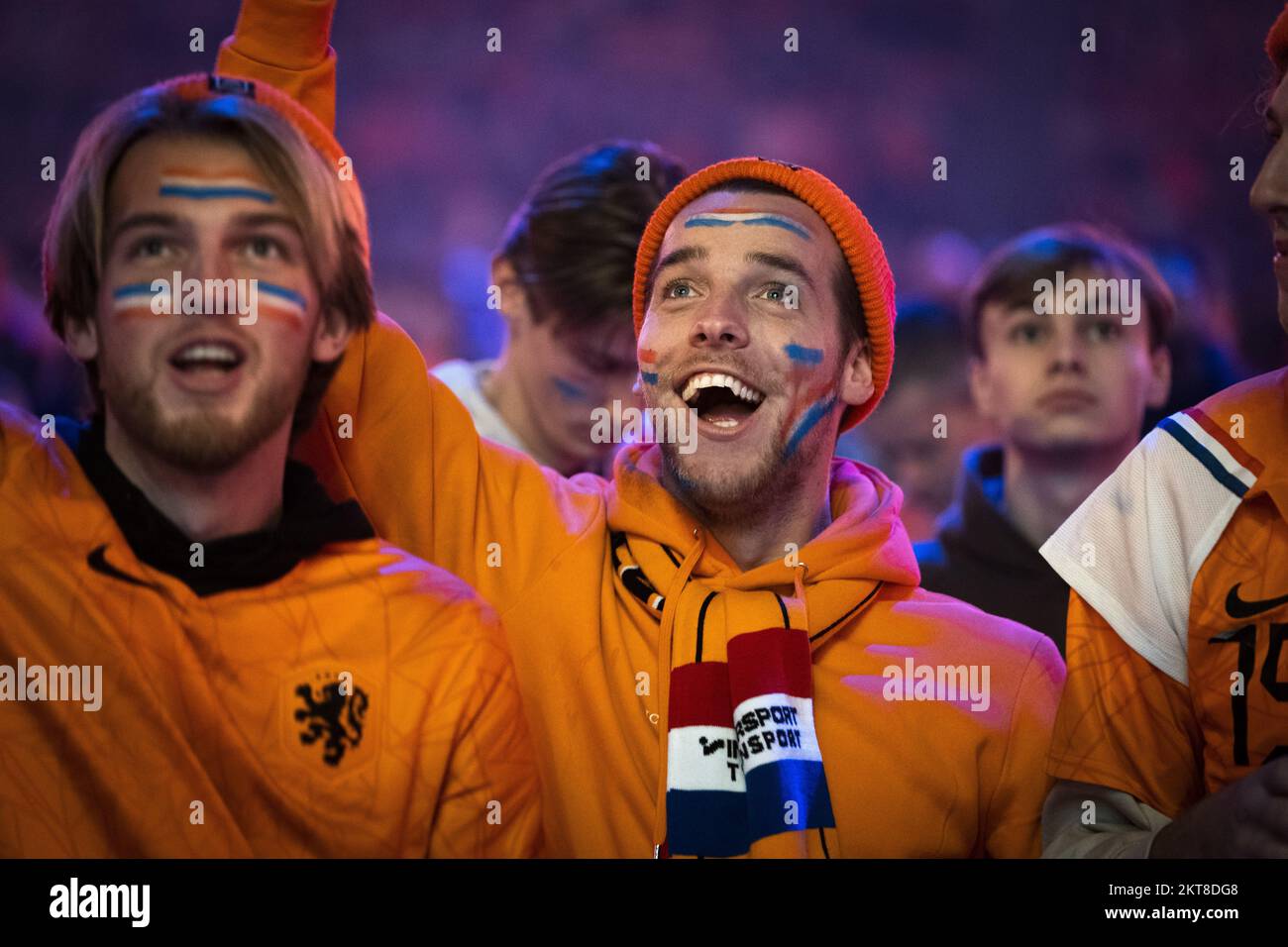AMSTERDAM - Visitors watch the third group match of the Dutch national ...