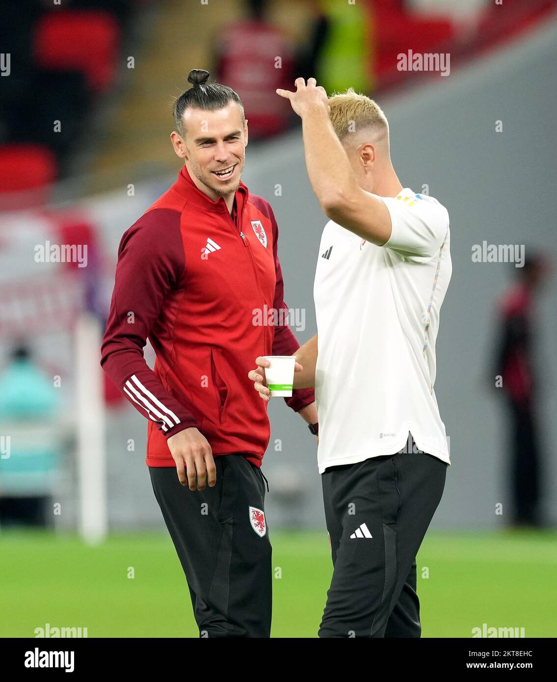 Wales' Gareth Bale and Aaron Ramsey inspect the pitch ahead of the FIFA ...