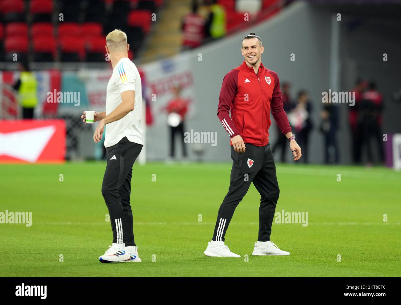 Wales' Gareth Bale and Aaron Ramsey inspect the pitch ahead of the FIFA ...