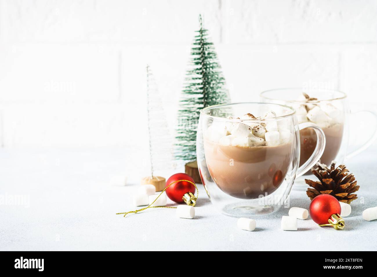 Christmas hot chocolate or cocoa with marshmallow on white with ...