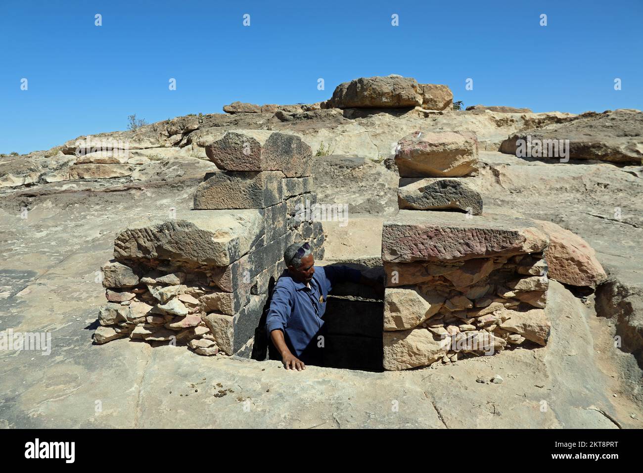 Entrance to a tomb at the ancient city of Qohaito in Eritrea Stock ...