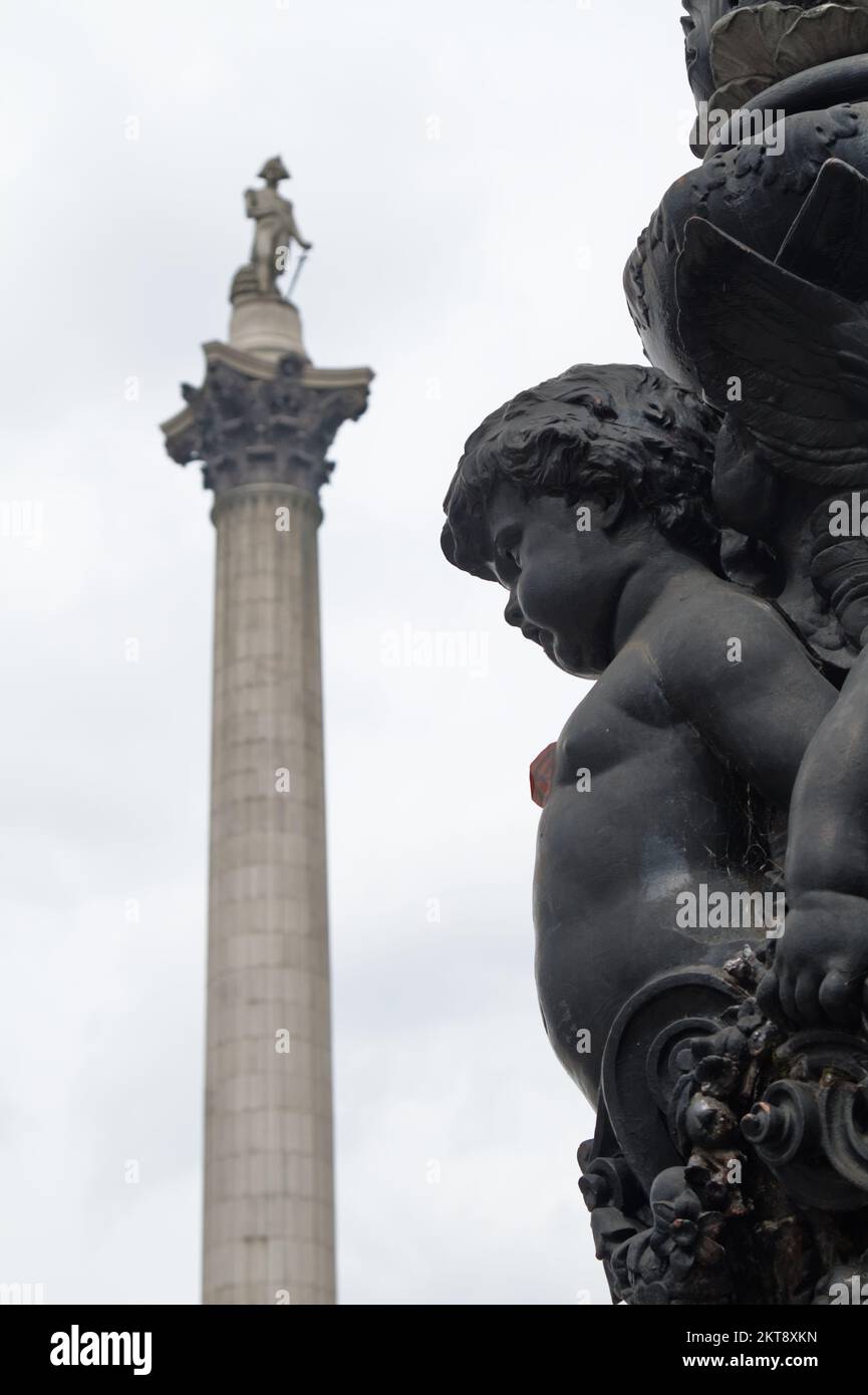 Cast Iron Cherub, Putti On The Side Of A Lamp Post, Street Lamp In ...