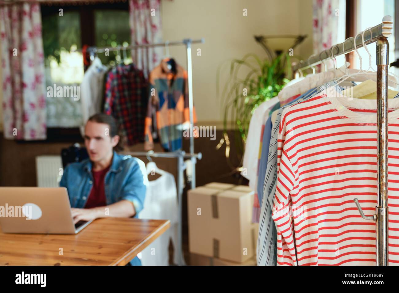 Pre owned clothes resale or donation Stock Photo - Alamy