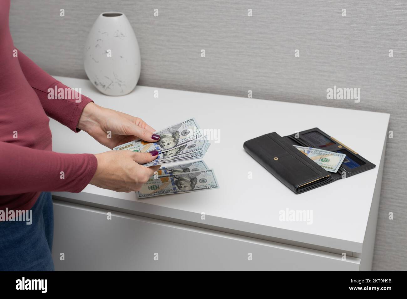 man counts cash dollars with his hands. man counting money Stock Photo ...