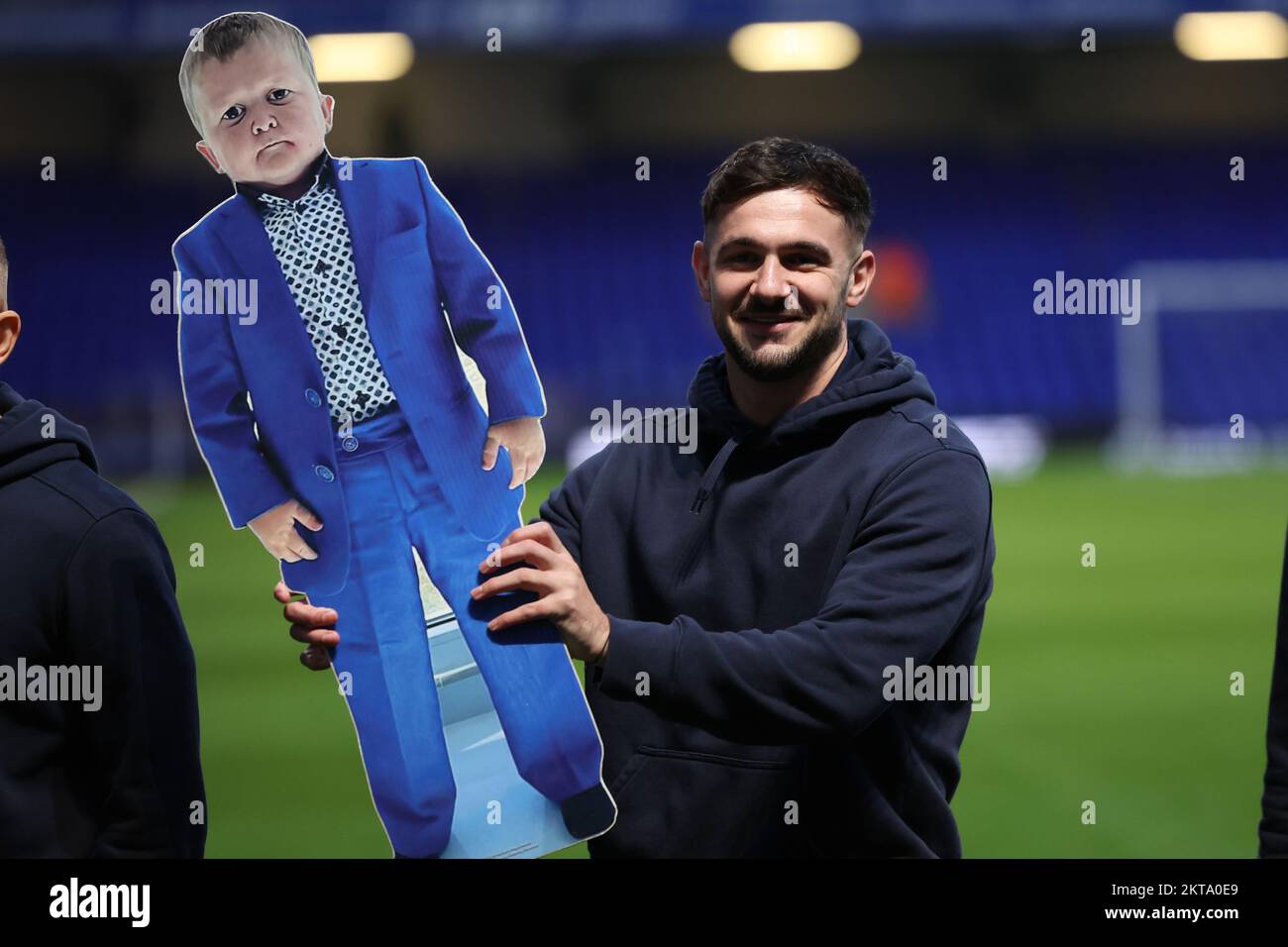Buxton players with a card board cut out of TikTok Hasbullah - Ipswich ...