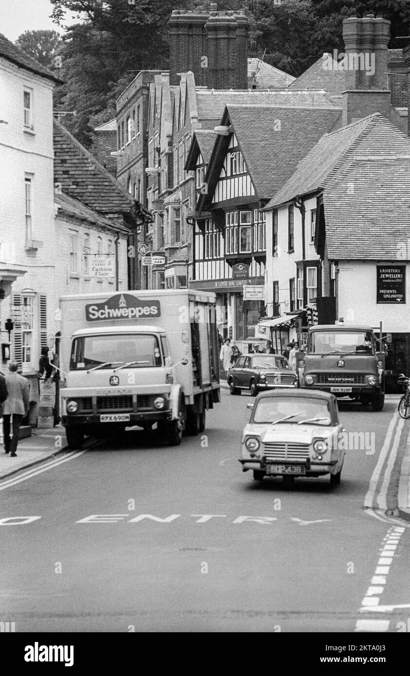 1976 black and white archive photograph of traffic in the High Street ...