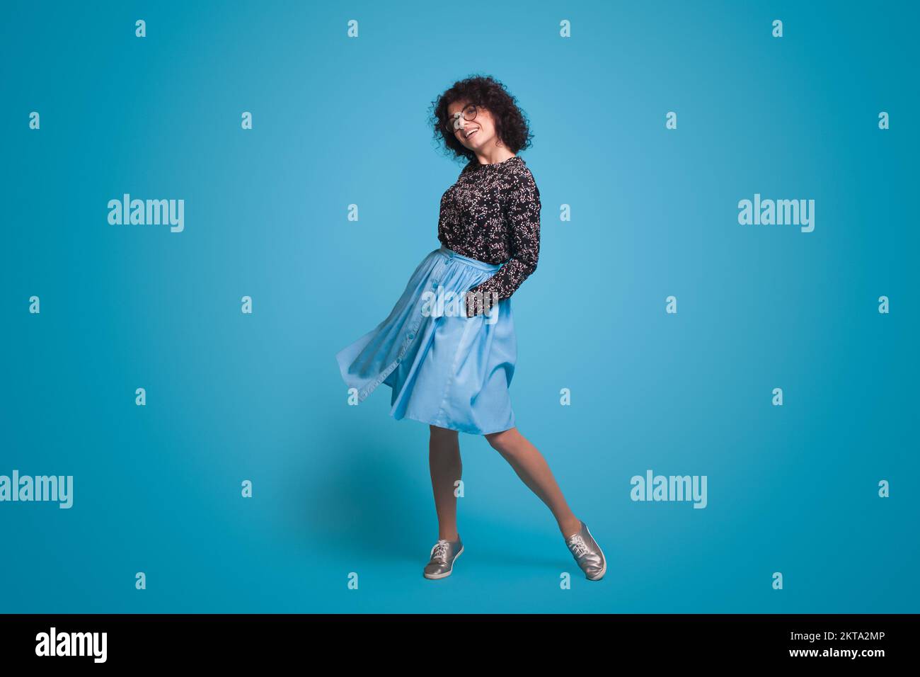 Photo of young beautiful happy smiling cheerful positive girl in skirt ...