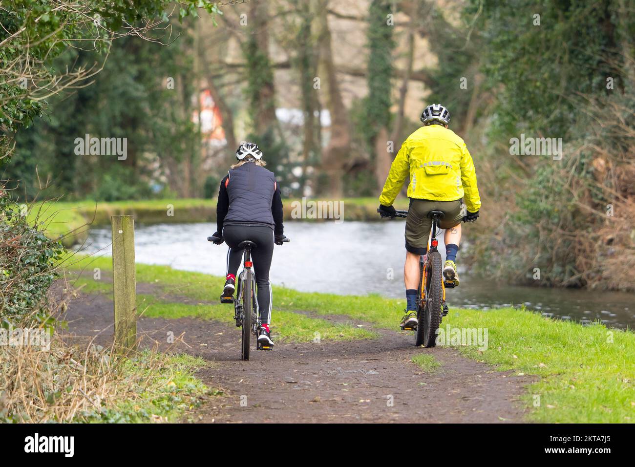 Two cyclists riding along towpath hi-res stock photography and images ...