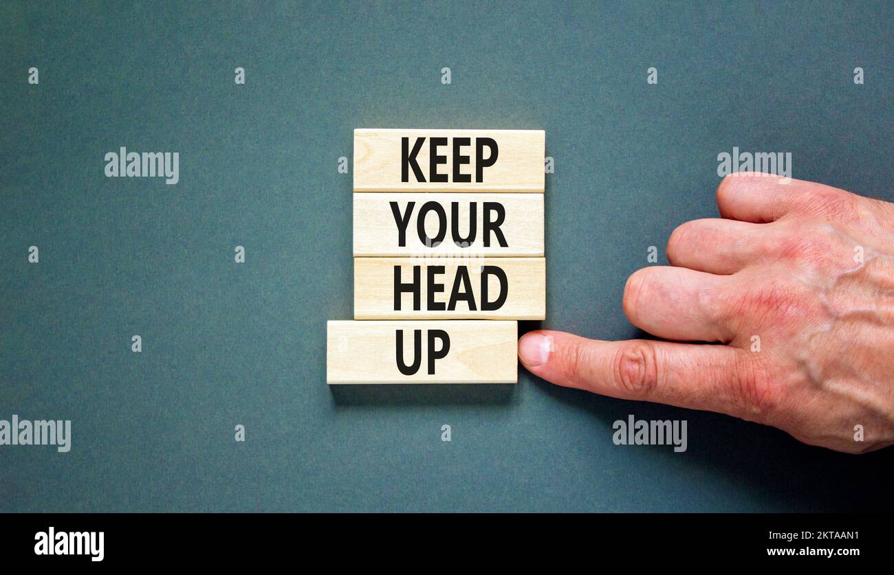 Keep your head up symbol. Concept words Keep your head up on wooden ...