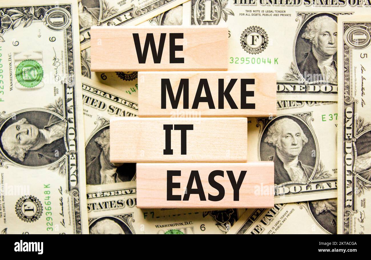 We make it easy symbol. Concept words We make it easy on wooden cubes ...