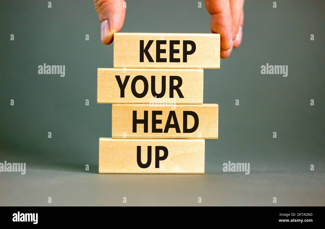 Keep your head up symbol. Concept words Keep your head up on wooden ...