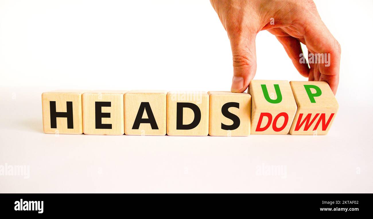 Heads up or down symbol. Concept words Heads up Heads down wooden cubes ...