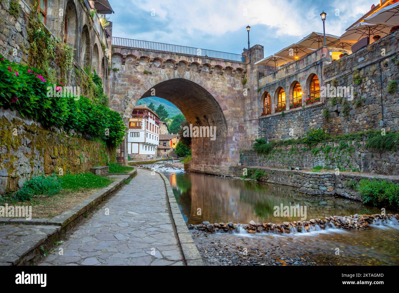 Medieval village of Potes with hanging houses and Deva river, Cantabria ...