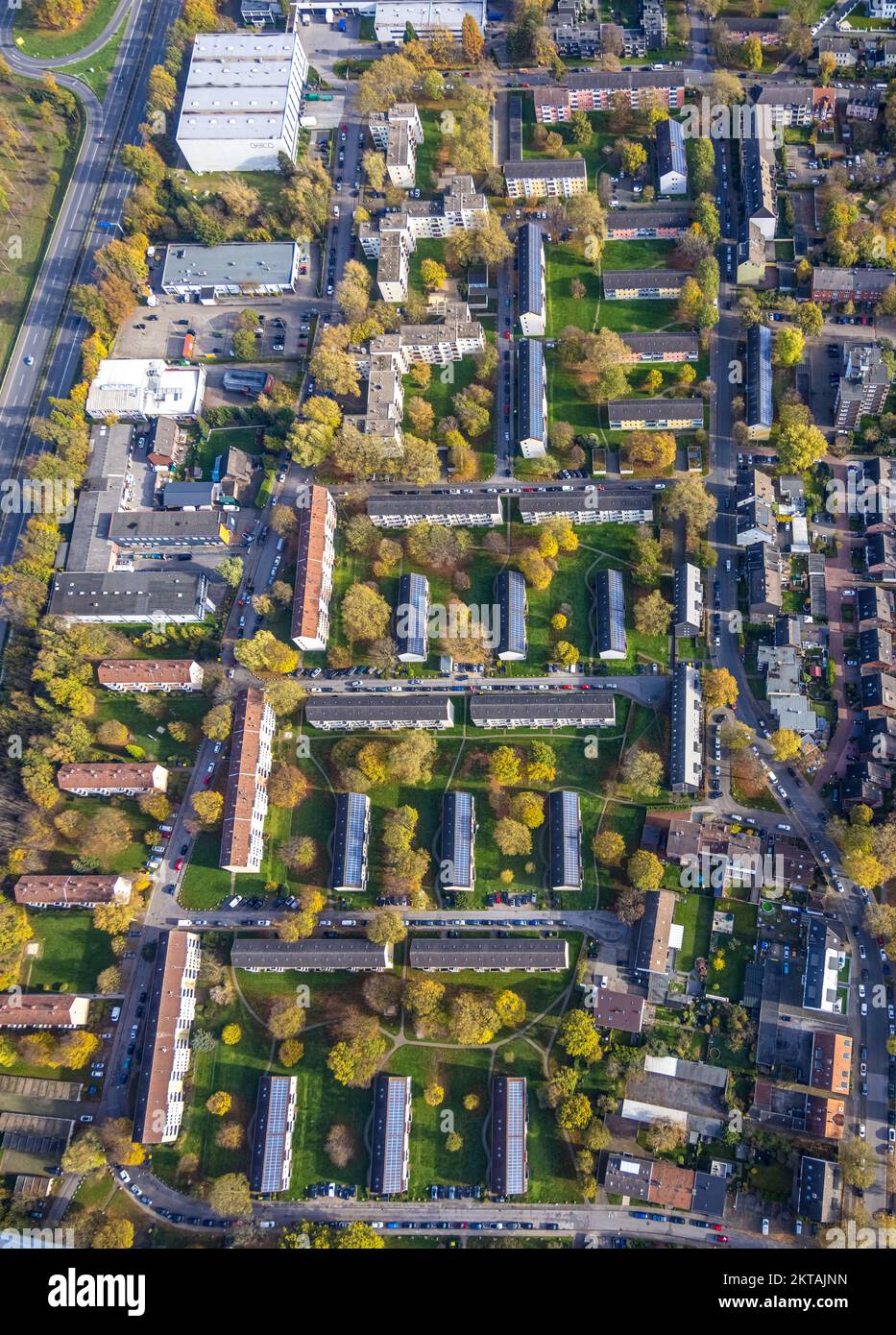 Aerial view, housing estate roofs, apartment block row houses ...