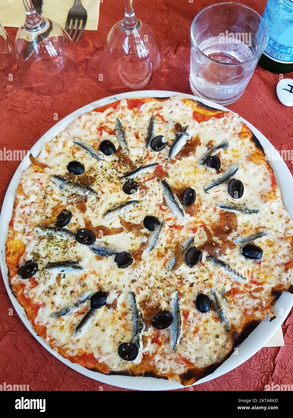 Pizza rustic style with fish Stock Photo - Alamy