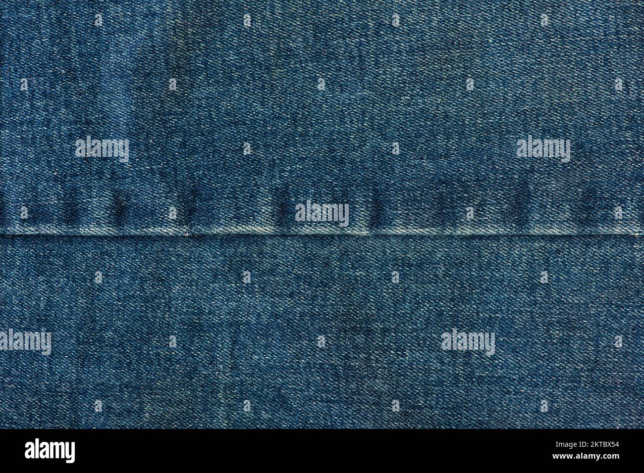 Texture of denim close-up. Jeans seam with place for text Stock Photo ...
