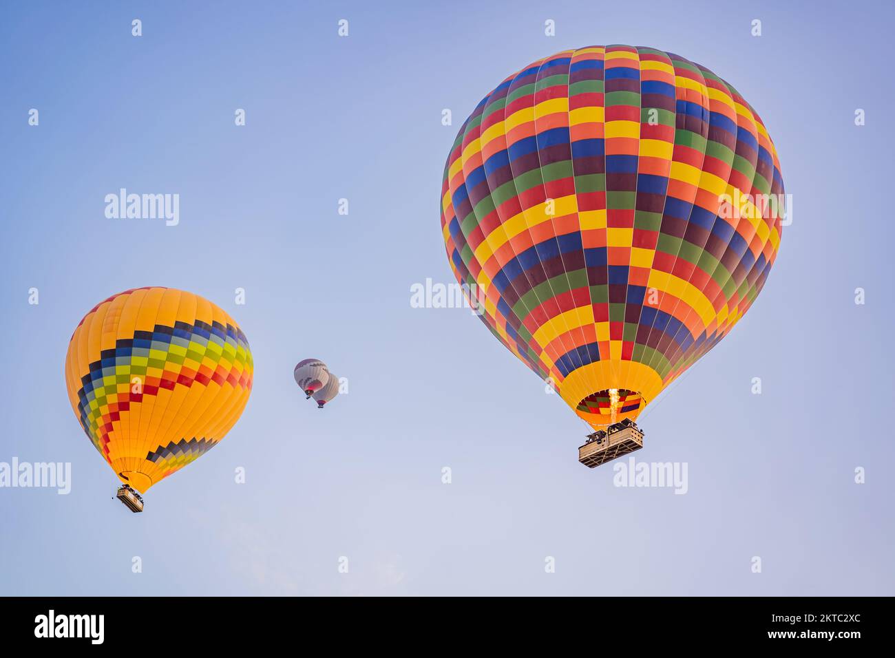 Beautiful hot air balloons over blue sky Stock Photo - Alamy