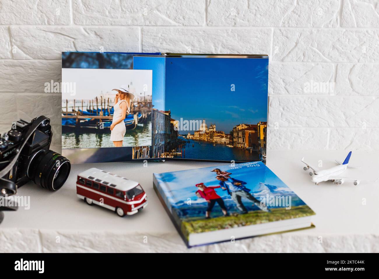 Photobook Album with Travel Photo with toy bus and plane. photo book ...