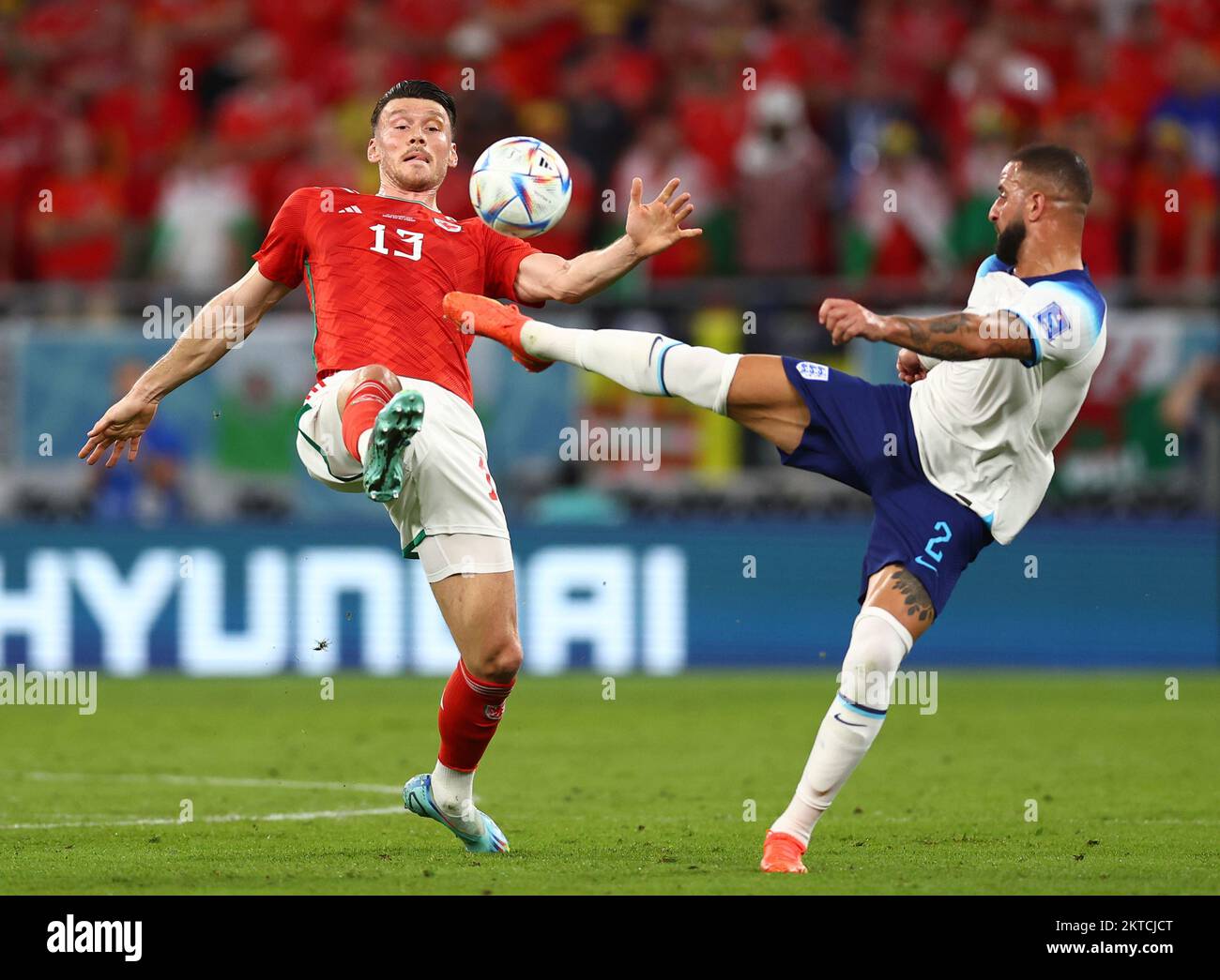 Al Rayyan, Qatar, 29th November 2022. Kiefer Moore of Wales tackles ...