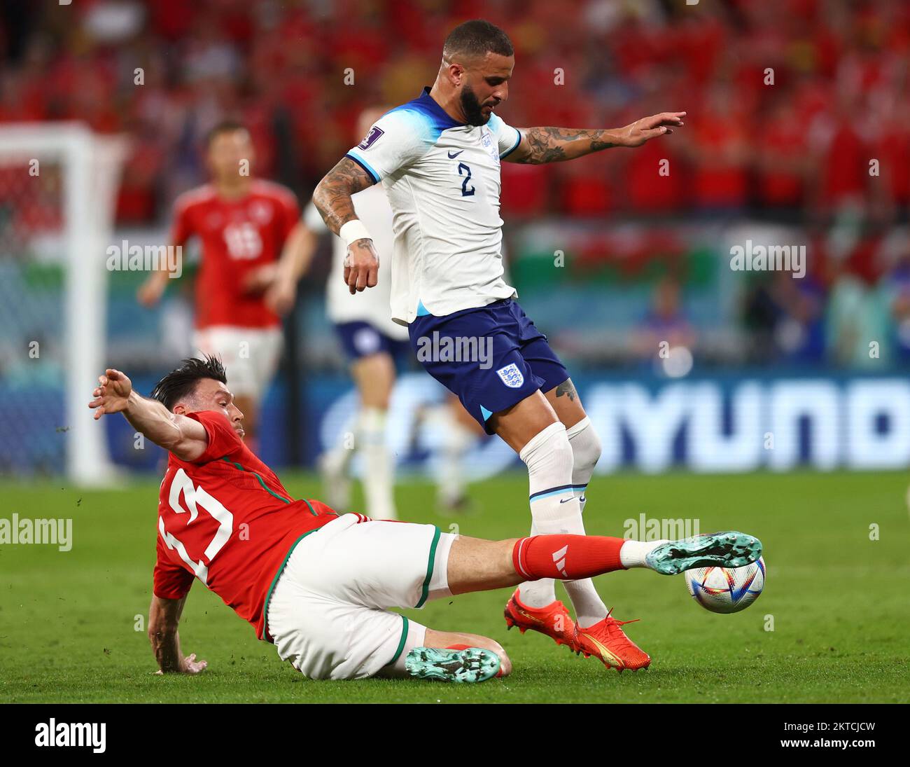 Al Rayyan, Qatar, 29th November 2022. Kiefer Moore of Wales tackles ...
