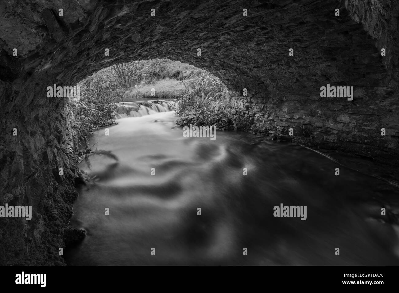 The Weir Water river flowing under Robbers Bridge in Exmoor National ...