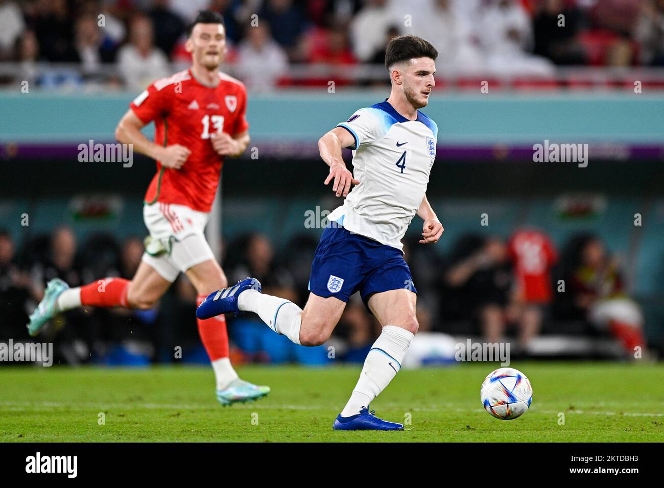 DOHA, QATAR - NOVEMBER 29: Declan Rice of England runs with the ball ...