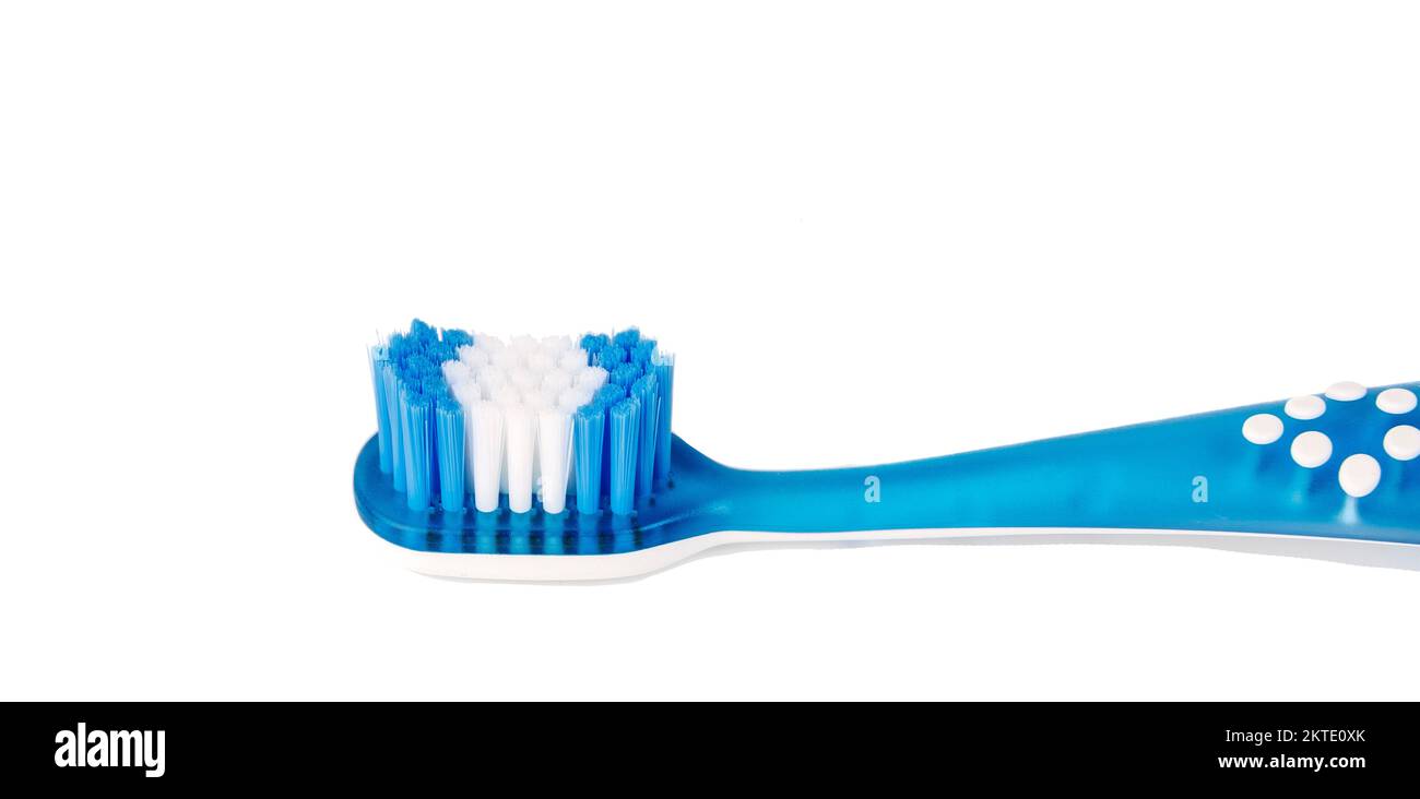 A baby blue toothbrush is isolated on a white background Stock Photo ...