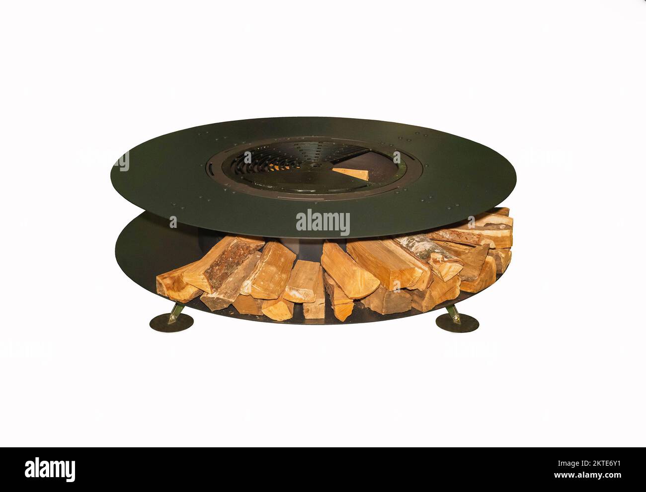 Huge round grill with firewood. Garden equipment for a picnic Stock ...