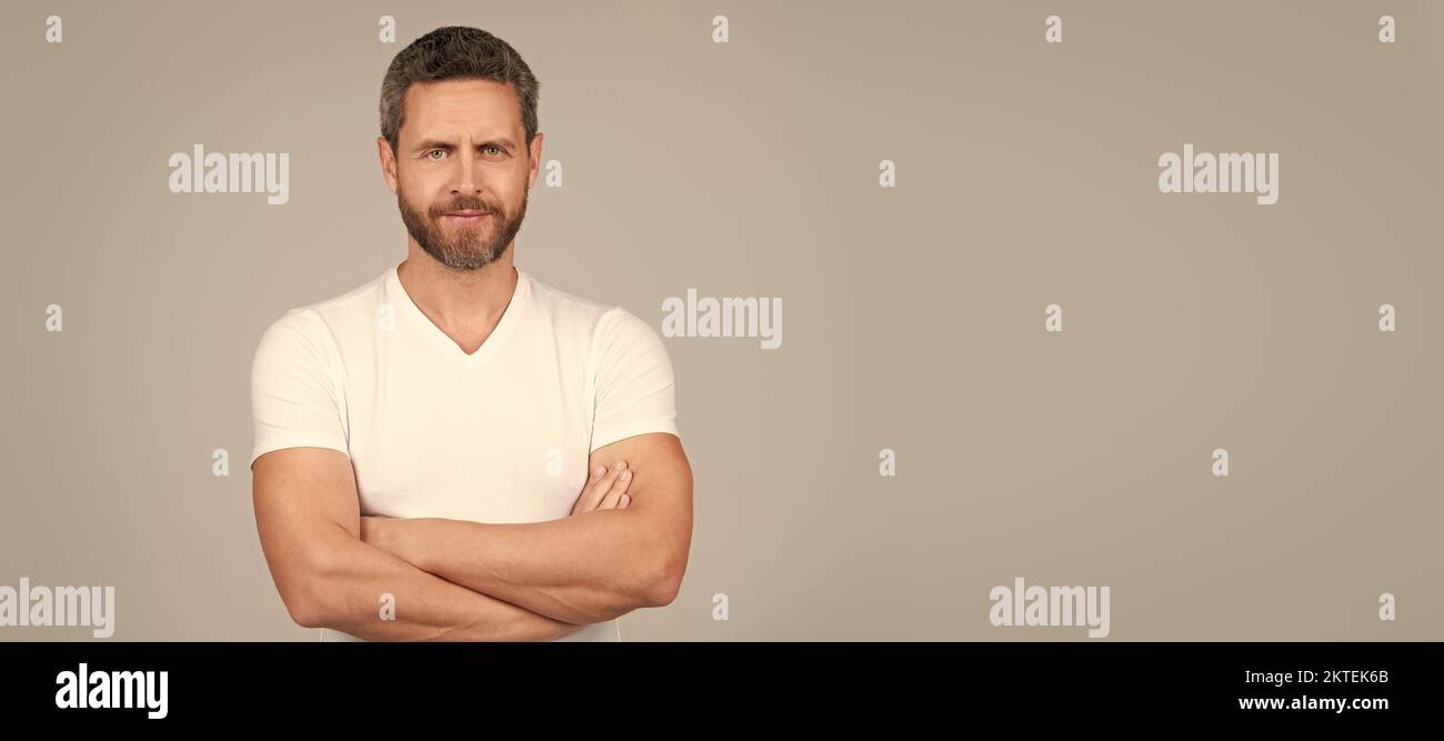 Being confident as a man. Confident unshaven man grey background ...