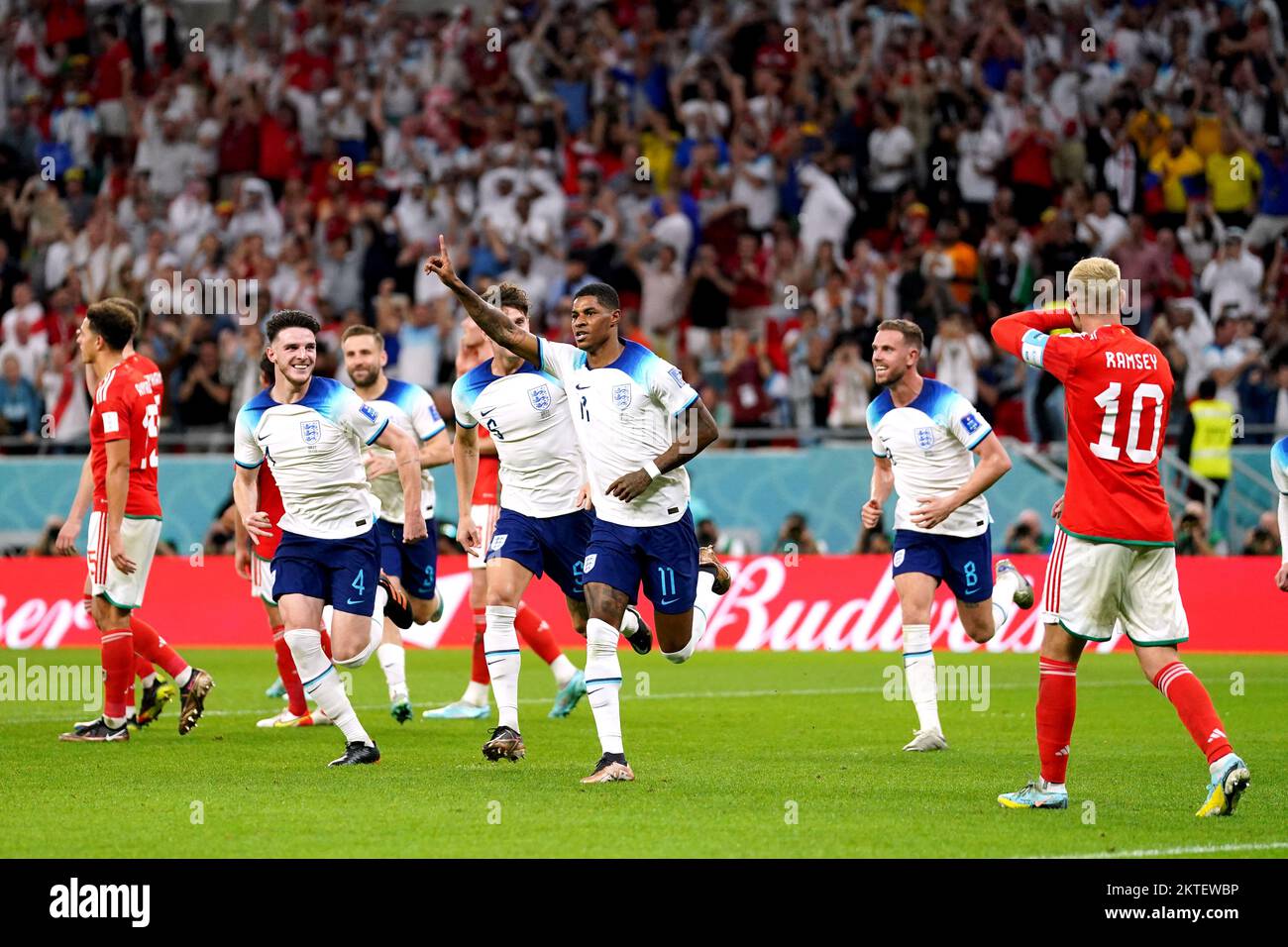 England's Marcus Rashford celebrates scoring the opening goal of the ...