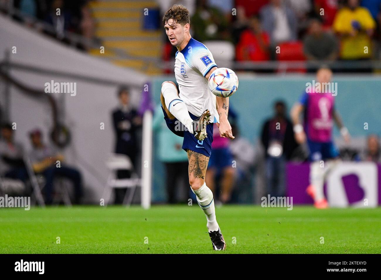 DOHA, QATAR - NOVEMBER 29: John Stones of England passes the ball ...