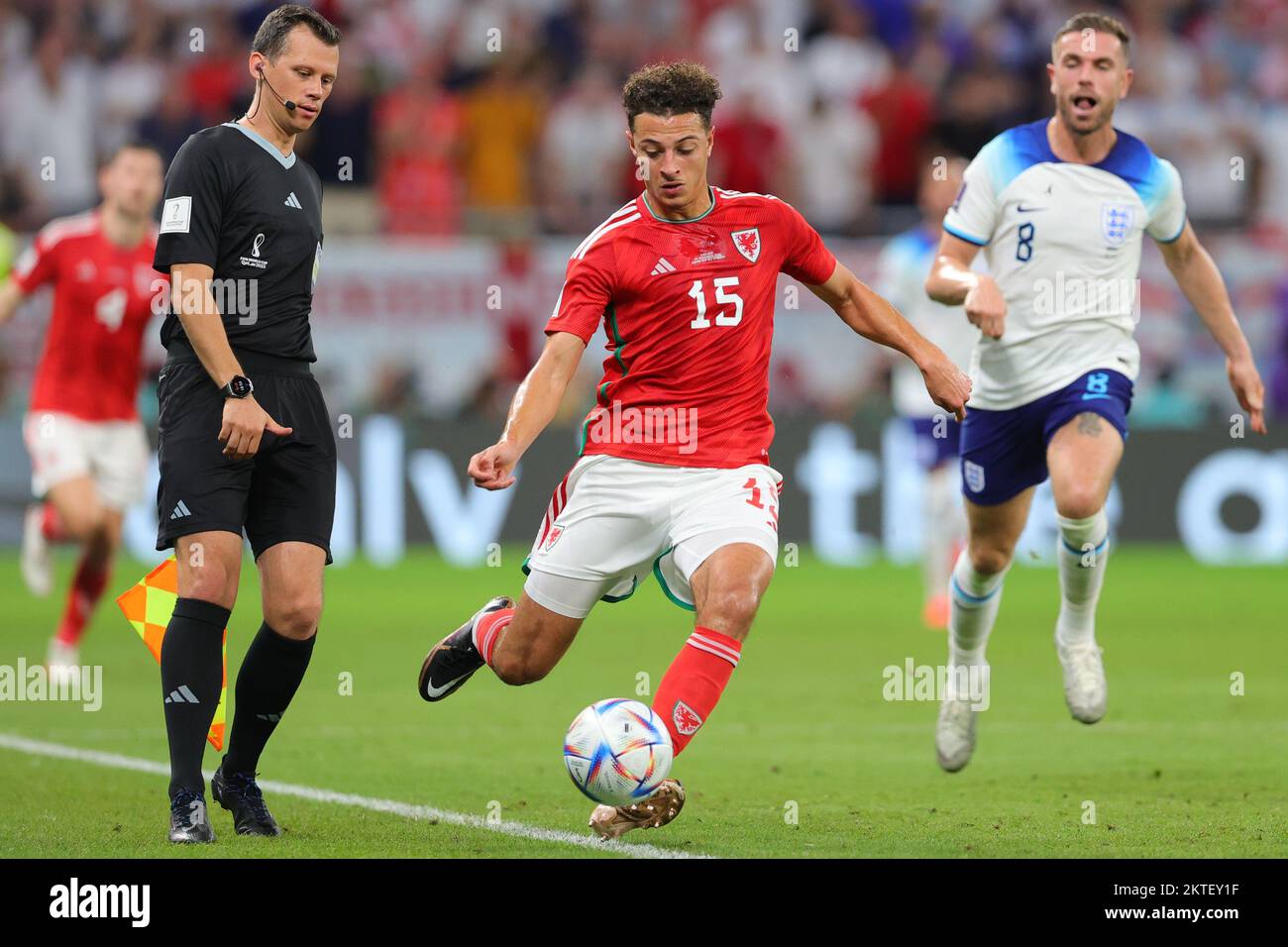 Ar Rayyan, Qatar. 29th Nov, 2022. Ethan Ampadu of Wales crosses the ...