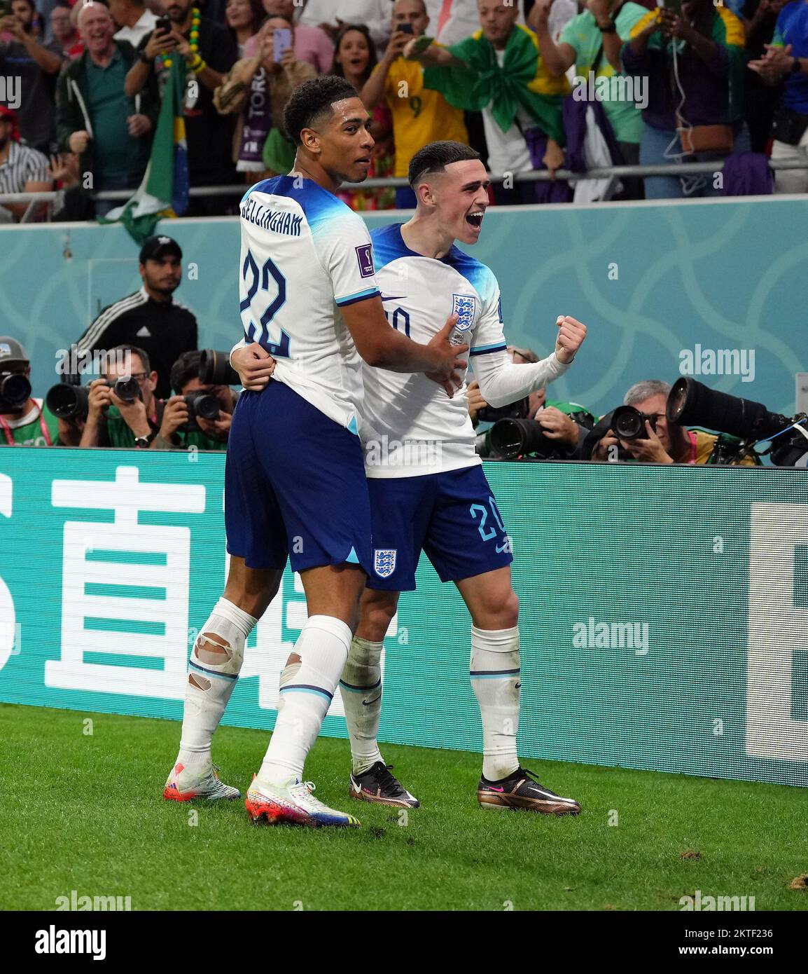 England's Phil Foden celebrates scoring the second goal with Jude ...