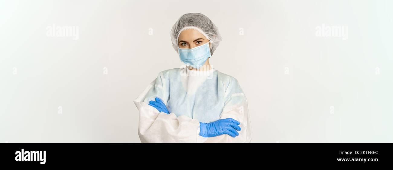 Portrait of doctor, female nurse in personal protective equipment ...