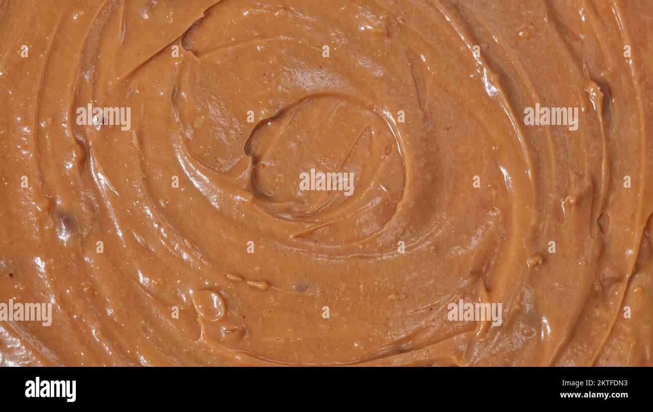 Background of chocolate paste with spoon in a basket Stock Photo - Alamy