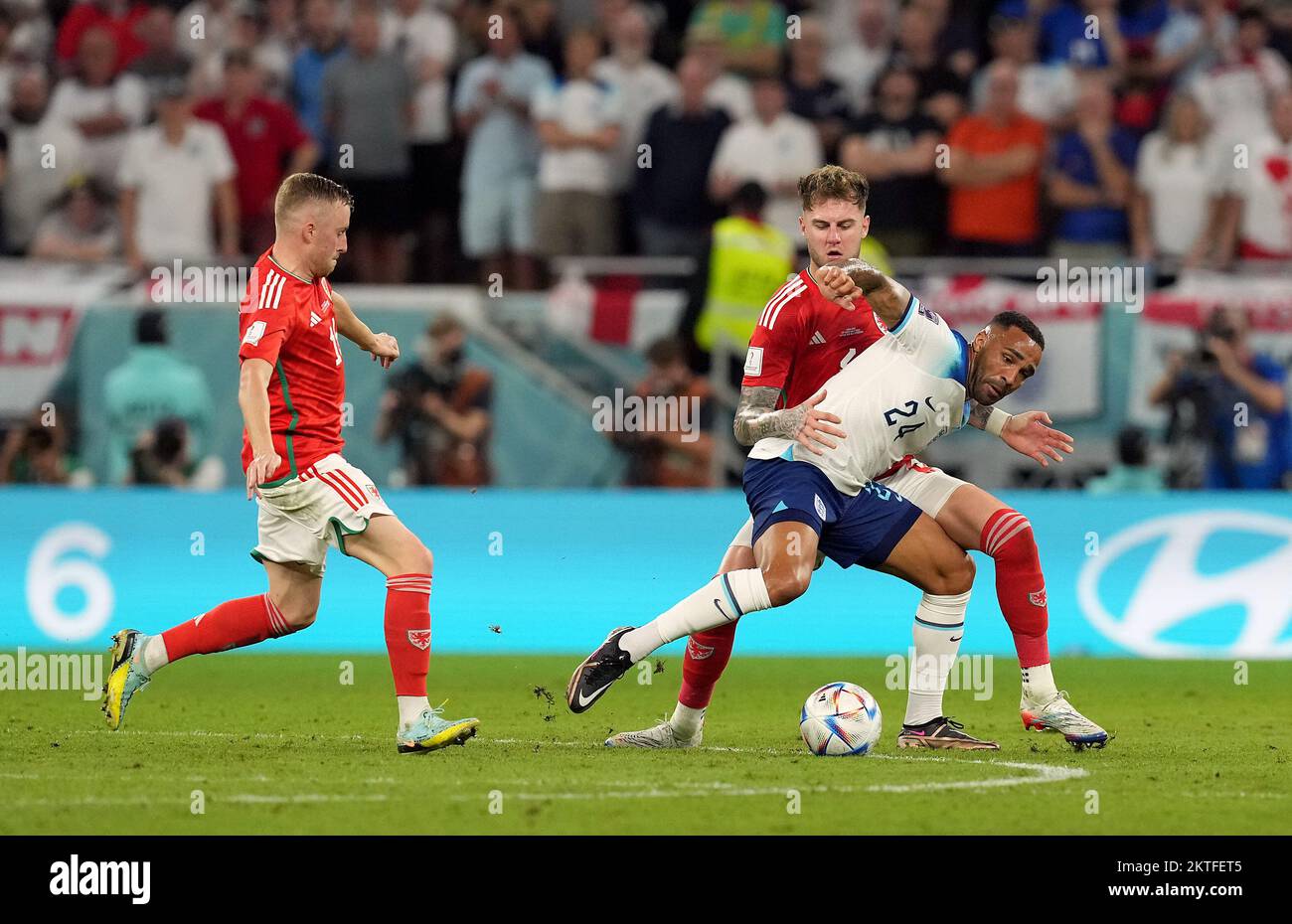 England’s Callum Wilson holds off Wales’ Joe Rodon during the FIFA ...