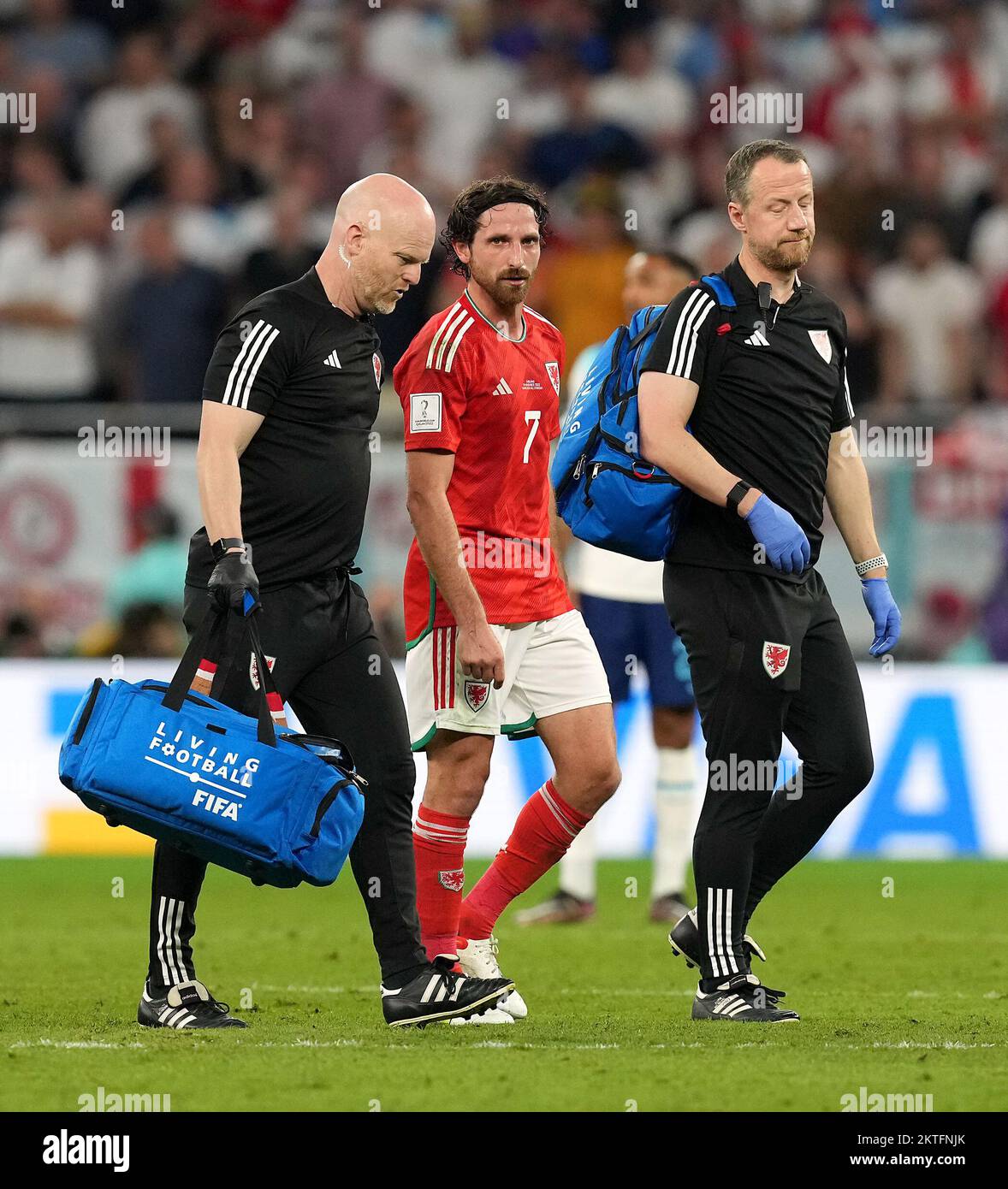 Wales’ Joe Allen goes off injured during the FIFA World Cup Group B ...