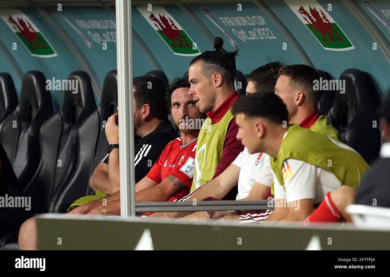 Wales’ Joe Allen with Gareth Bale on the bench during the FIFA World ...