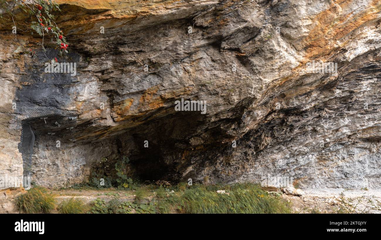 Well-maintained and guarded rocky tunnels in a mountainous area ...