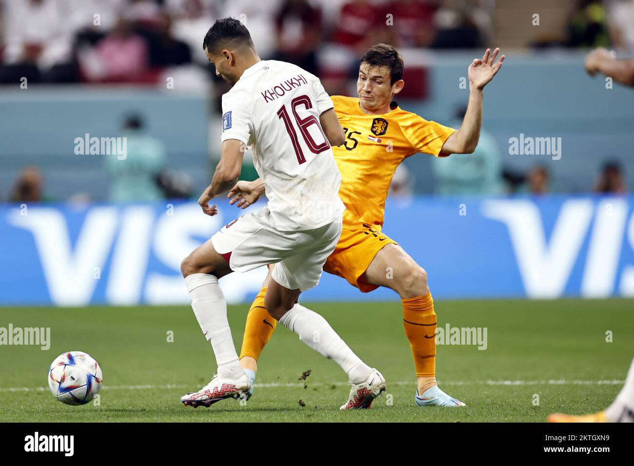 AL KHOR - (l-r) Boualem Khoukhi of Qatar, Marten de Roon of Holland ...