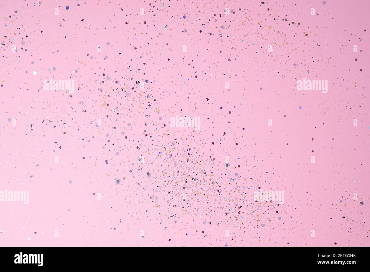 Sequins on pastel pink background. Festive concept. High quality photo ...