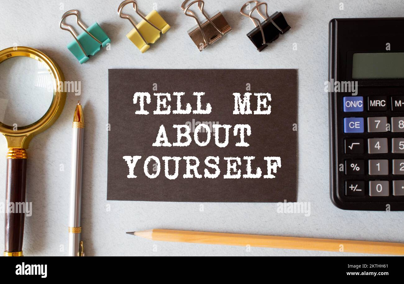 Motivation concept.Text Tell Me About Yourself writing on clip board ...