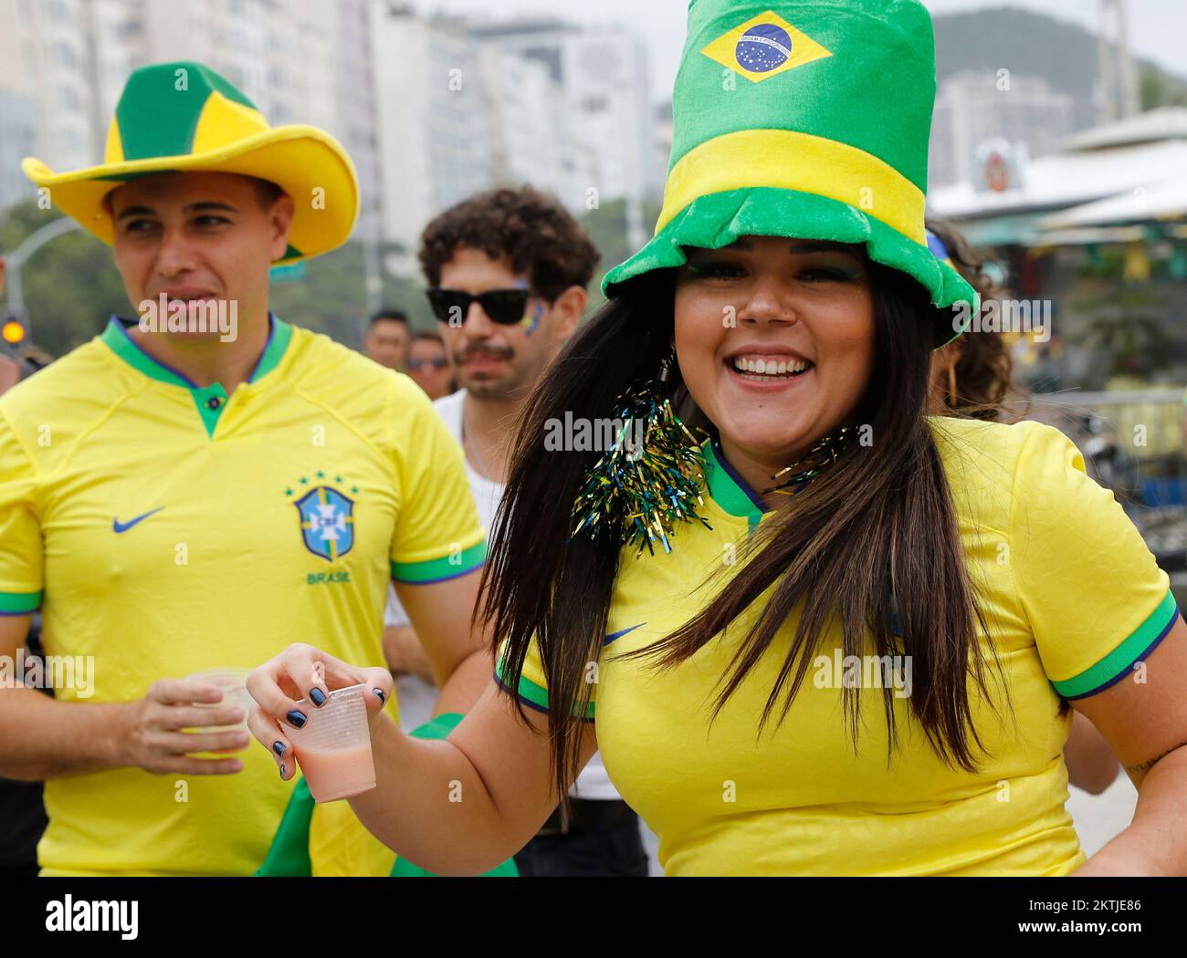 Brazilian fans gather at street party to support national soccer team ...