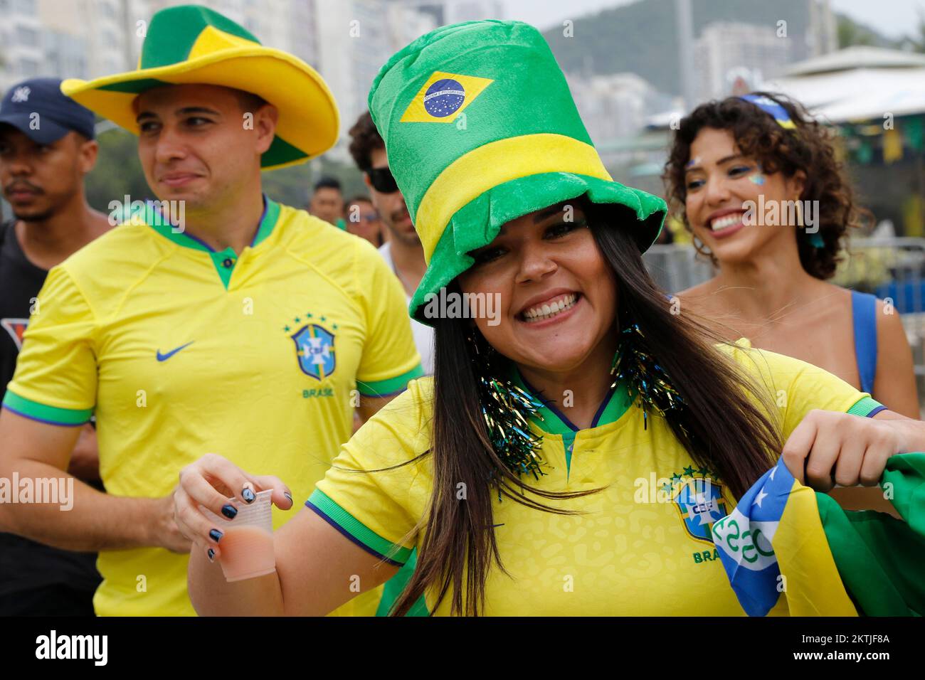 Brazilian fans gather at street party to support national soccer team ...