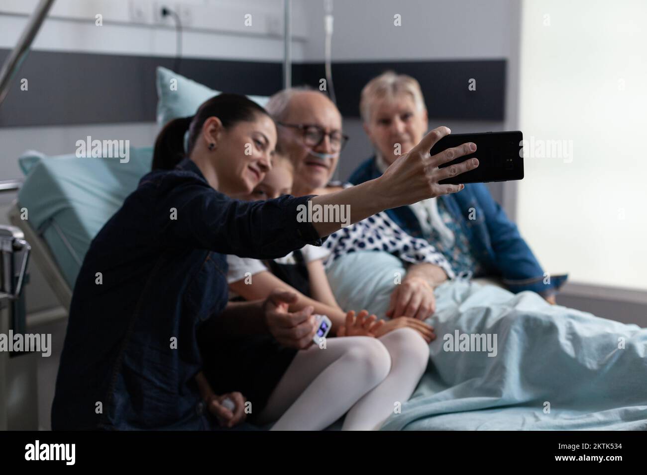 Accompanying hospitalized elderly man for routine checkups capturing ...
