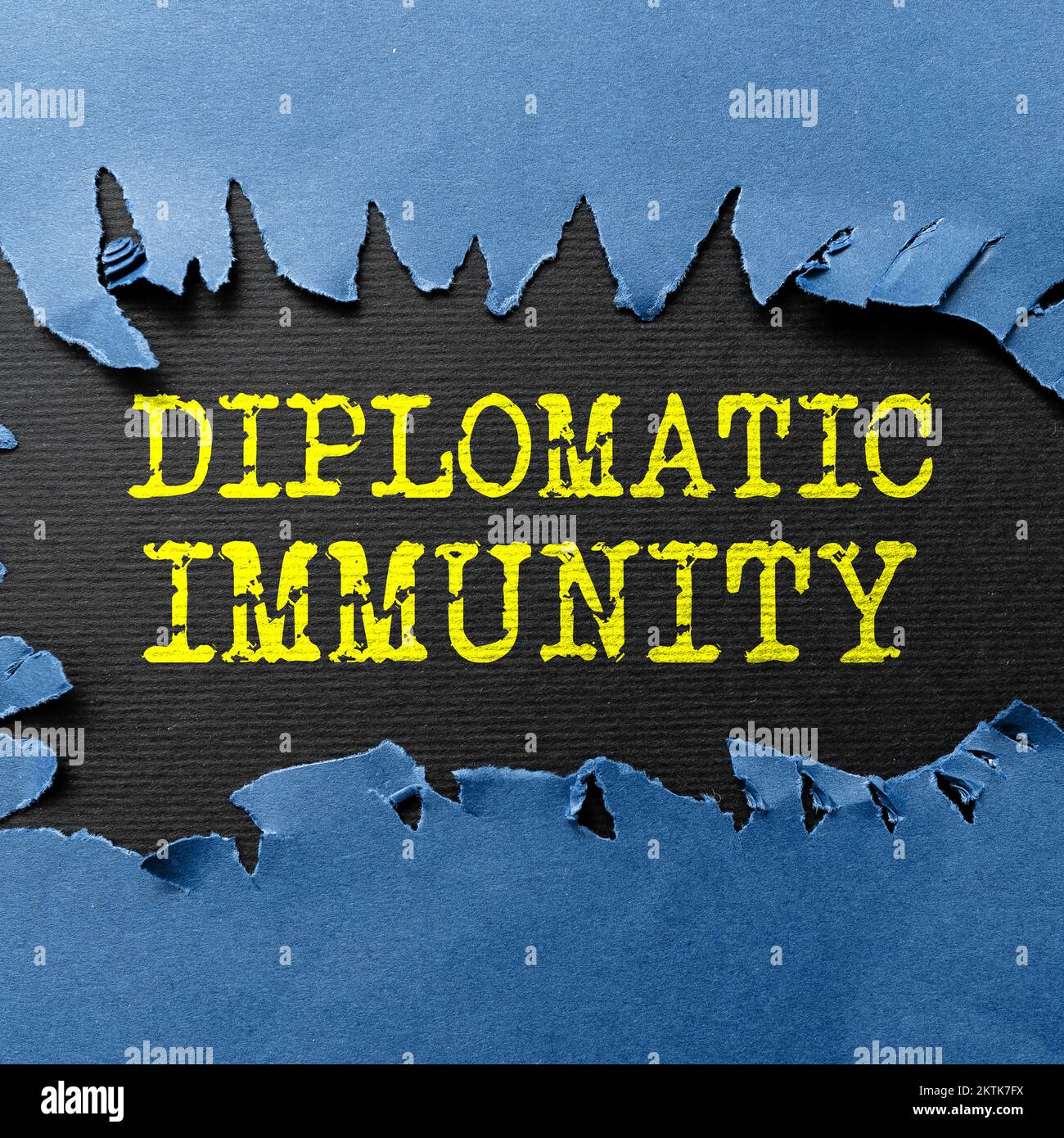 Sign displaying Diplomatic Immunity, Business overview law that gives ...