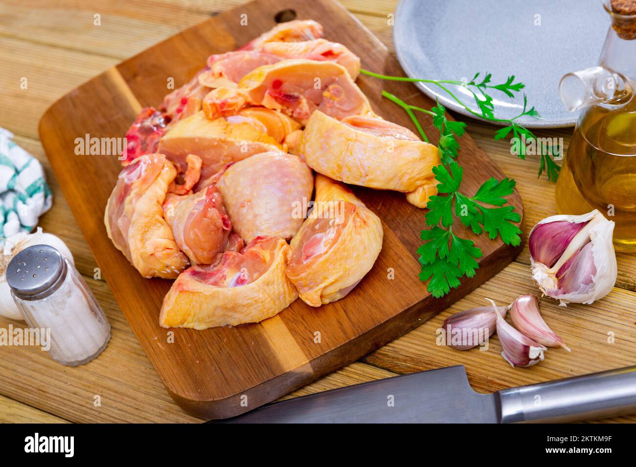 Fresh raw chopped chicken pieces Stock Photo - Alamy