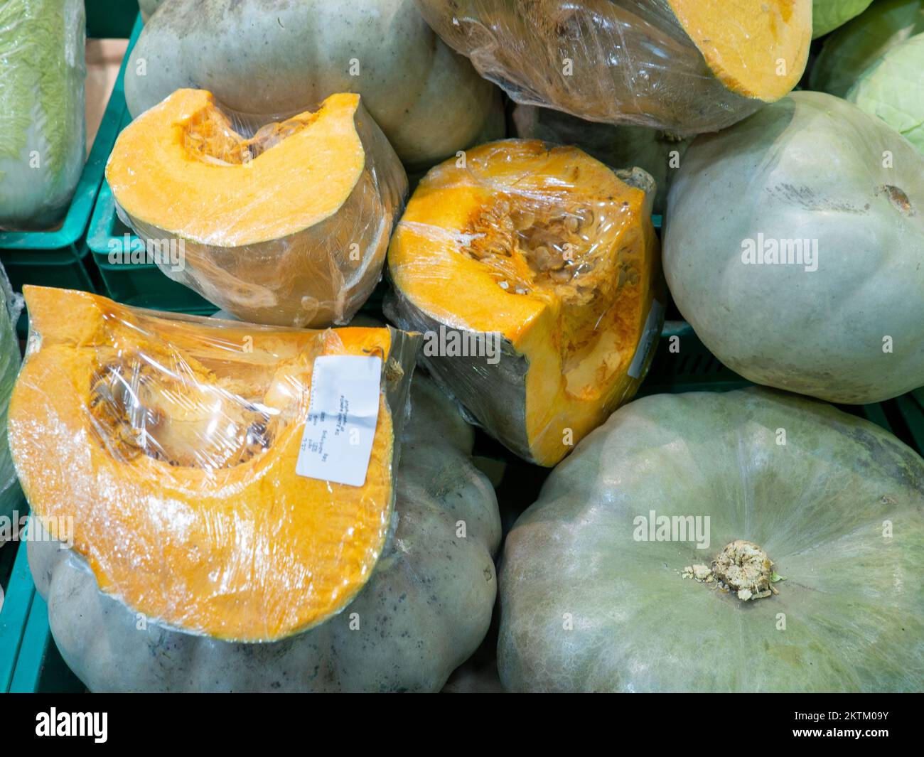 Store shelves. Carved pumpkin. Vegetables and fruits. Counter with ...