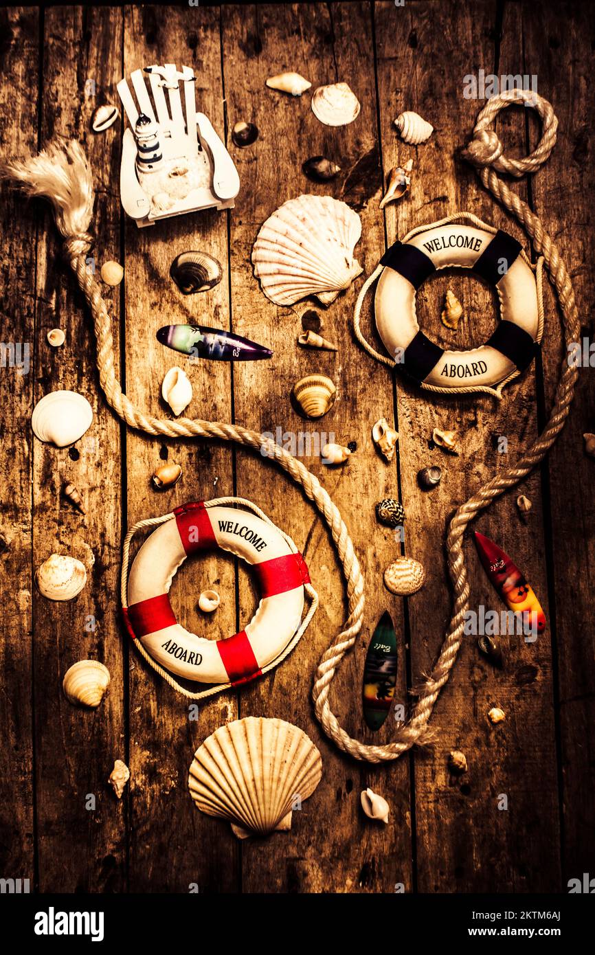 Vintage style nautical art on a abstract of maritime sea objects placed ...