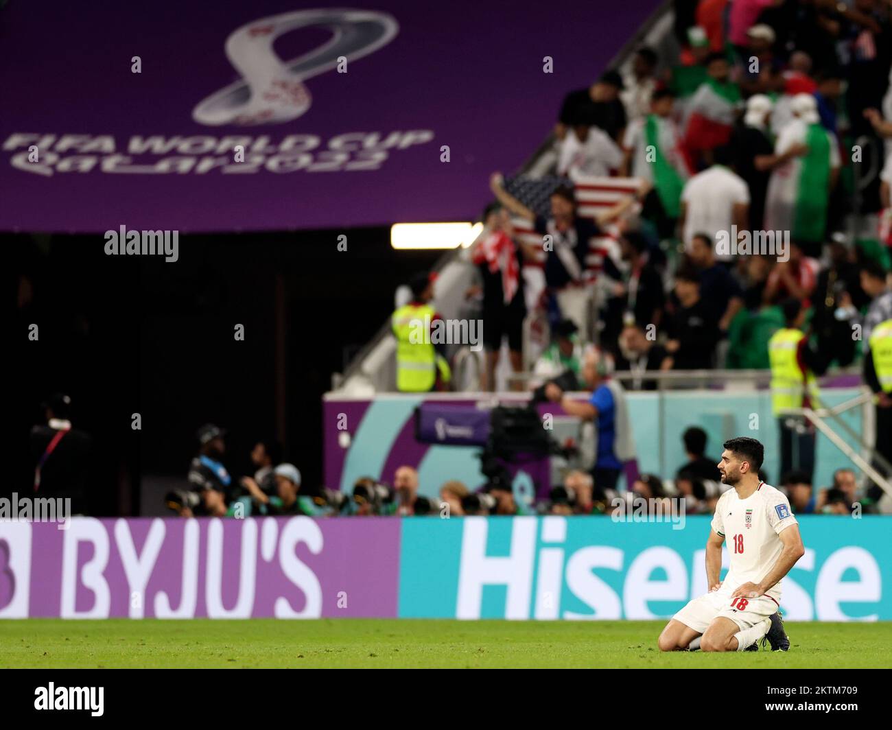 Doha, Qatar. 29th Nov, 2022. Ali Karimi of Iran looks dejected after ...